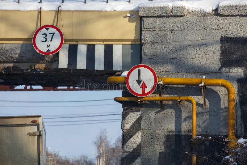 Road Signs Under Railroad Bridge Over Road - Yield and 3 Meter Maximum ...