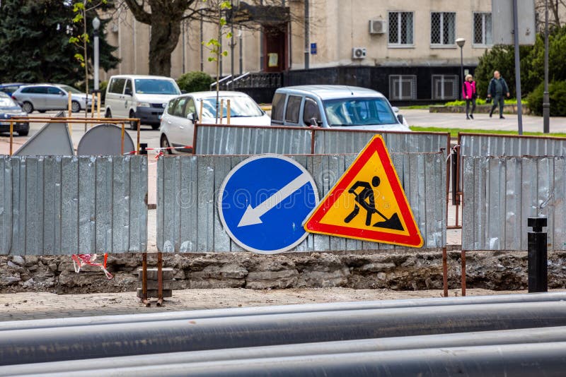 Road Signs! Road Works with Trucks and Traffic Signs. Road Blocked ...