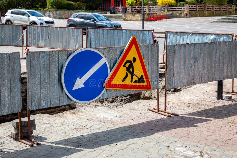 Road Signs! Road Works with Trucks and Traffic Signs. Road Blocked ...
