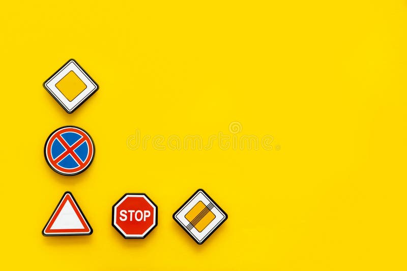 Road Signs on Yellow Background with Copy Space Stock Image - Image of ...