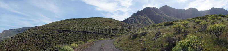 Road on slope stock photo. Image of blue, mountain, track - 140270846