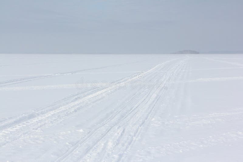 The Road on Snow Cover of the Frozen River in the Winter Stock Image ...