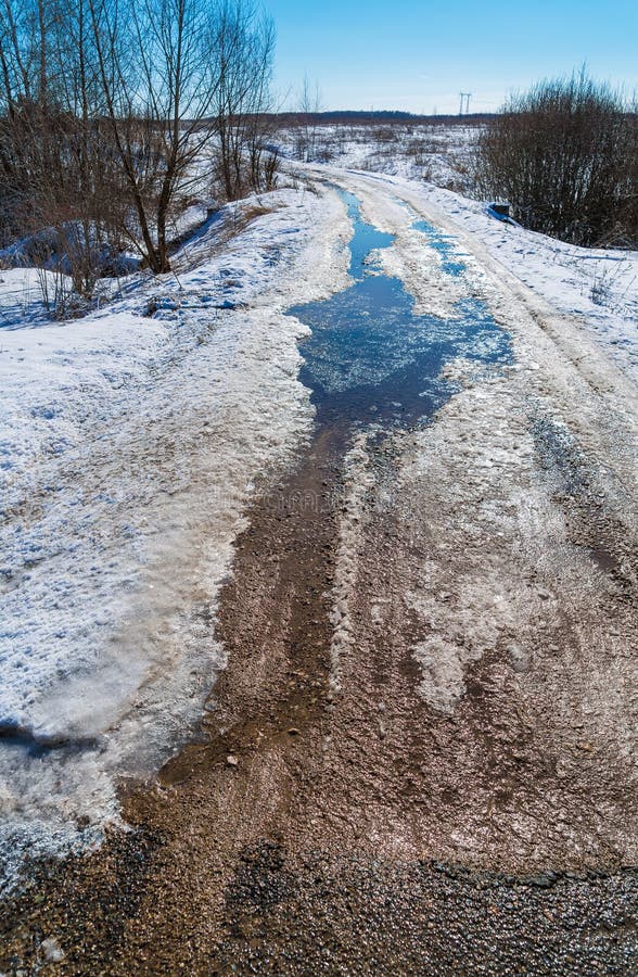 The Road during the Spring Thaw with Mud Stock Image - Image of farm ...