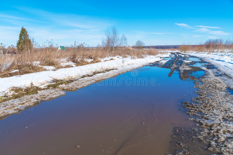The Road during the Spring Thaw with Mud Stock Photo - Image of outdoor ...