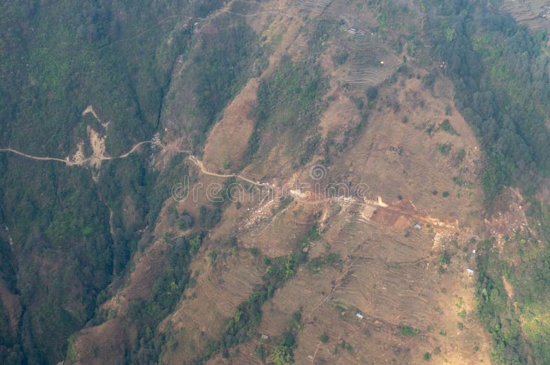 Road on Steep Hillside and Small Landslides Stock Image - Image of soil ...