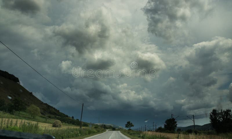 A road and storm sky stock image. Image of clouds, storm - 41902827
