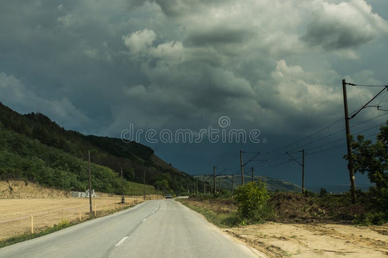 A road and storm sky stock image. Image of clouds, storm - 41902827