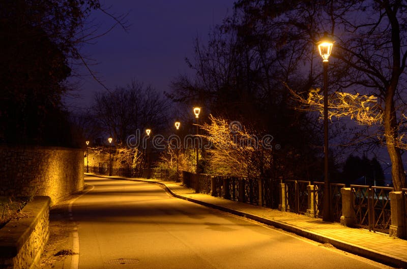 Road with street lamps stock photo. Image of night, antique - 36595506