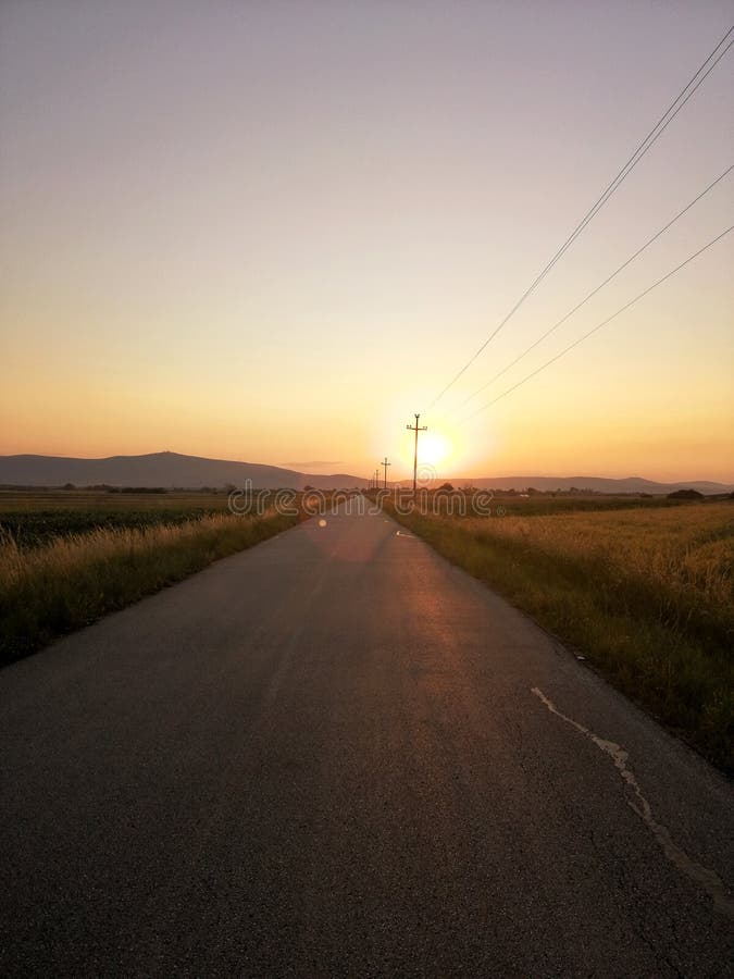 Road and sunset stock image. Image of route, walking - 224504537