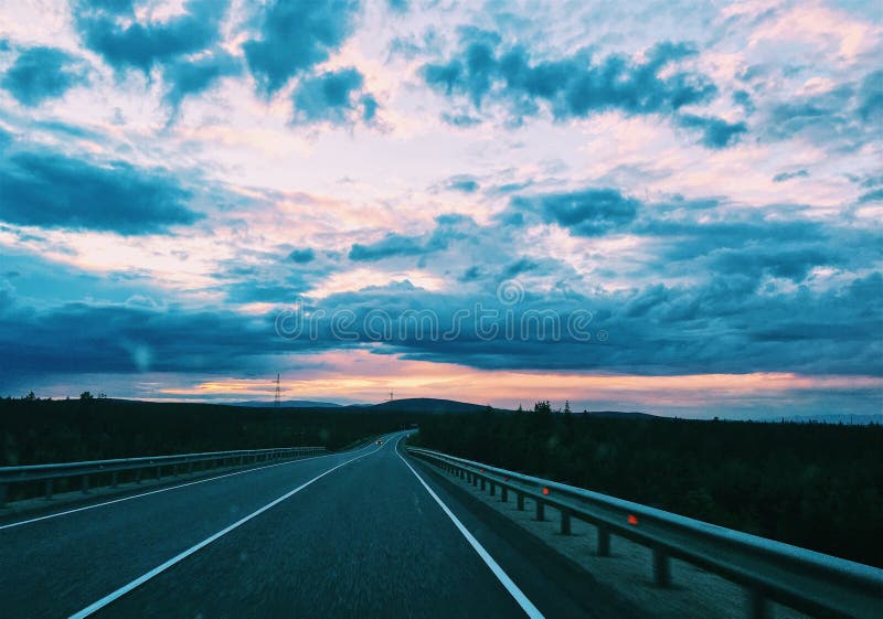 Road at sunset stock photo. Image of road, landscape - 130909330