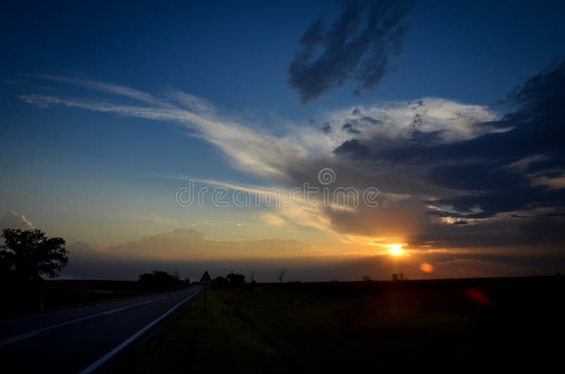 Road and sunset stock photo. Image of highway, dramatic - 101715572