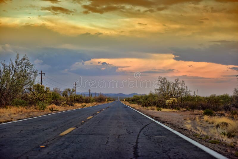 Road at sunset stock photo. Image of cloud, gold, landscape - 75262466