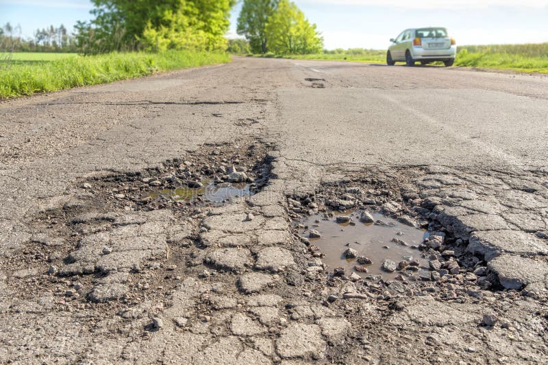 Road in Terrible Condition. Stock Image - Image of danger, potholes ...