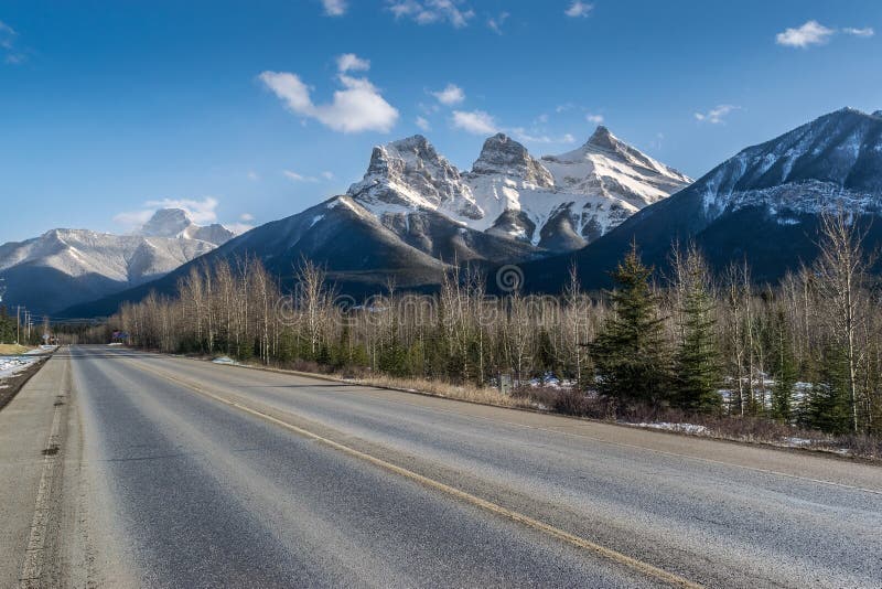 Road and Three Sisters Mountains Stock Photo - Image of banff, range ...
