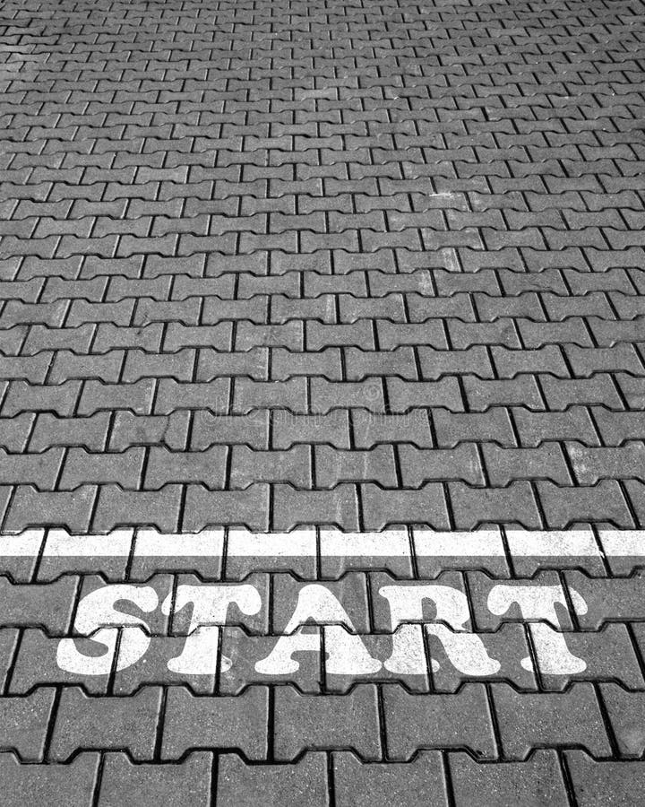 Road Tile with a White Inscription Start Stock Photo - Image of race ...