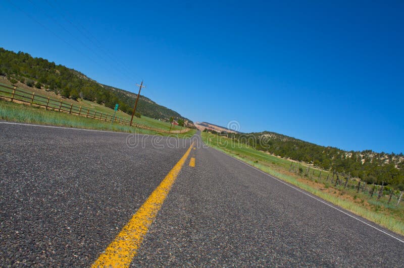 Road Tilt stock image. Image of line, lush, yellow, road - 6640553