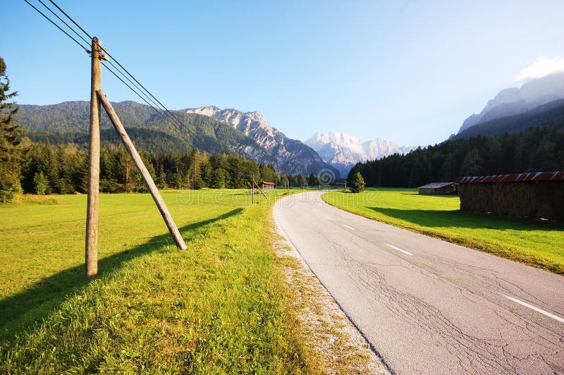Road to alps stock image. Image of road, planica, grass - 6527655