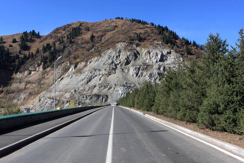 Road to hill stock photo. Image of color, line, blue - 16736408