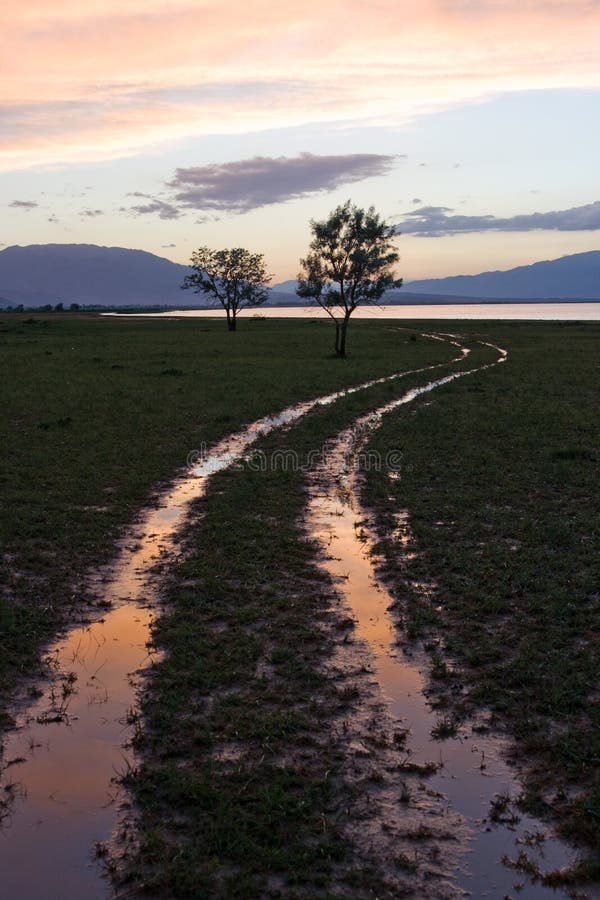 Road to lake stock photo. Image of grassland, lone, kyrgyzstan - 10088790