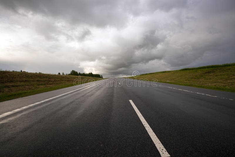 The road to a storm stock photo. Image of curve, cloudscape - 27495276