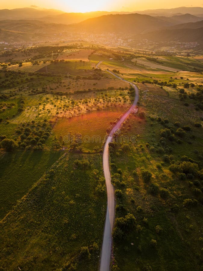 The road to the sunset stock photo. Image of sunset - 242063200