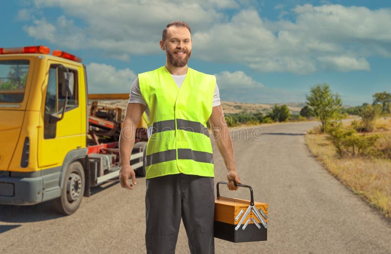 Road Towing Company Worker Posing on a Highway Stock Image - Image of ...