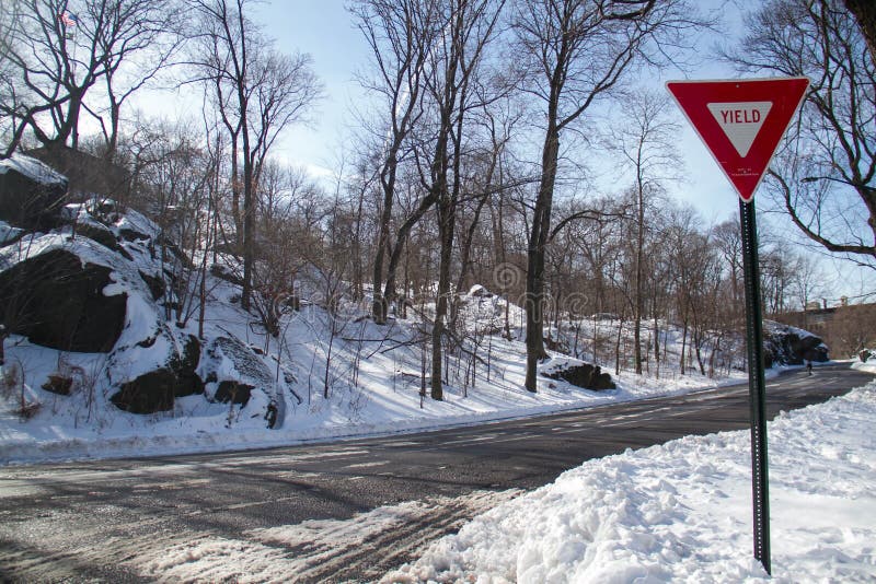 Road and Traffic Sign on Snow at Park, Central Park Stock Image - Image ...