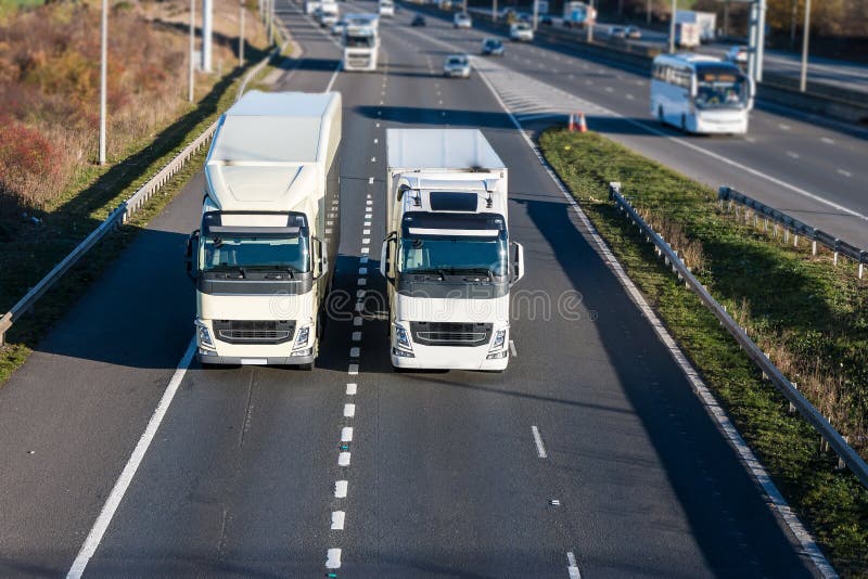 Road Transport - Lorries on the Motorway Stock Photo - Image of shadow ...