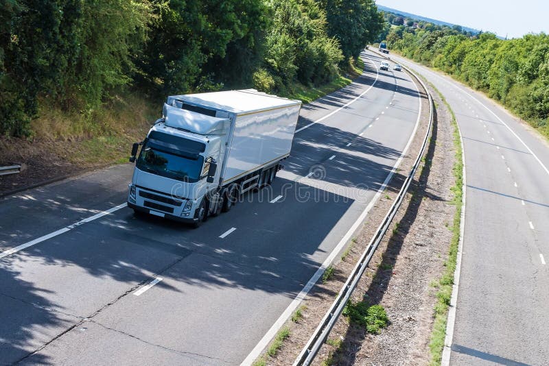 Road Transport - Lorry on the Road Stock Photo - Image of front, curve ...