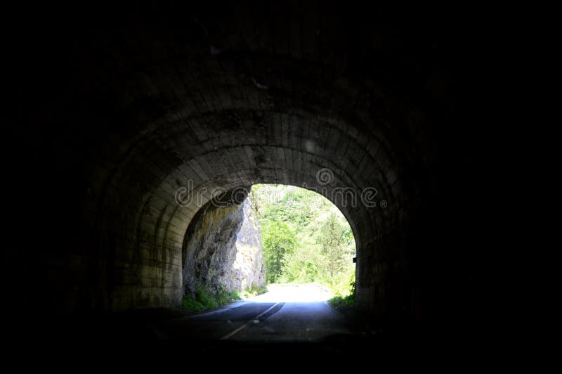 Road tunnel in the rock stock image. Image of infrastructure - 270201329