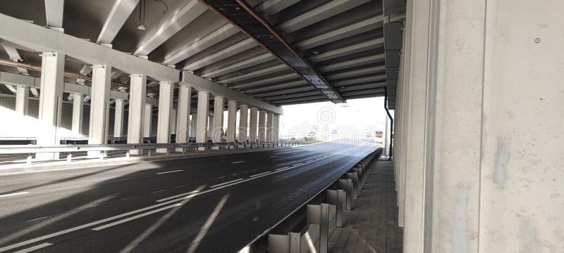 Road in the Tunnel Under the Bridge Stock Image - Image of detail, home ...