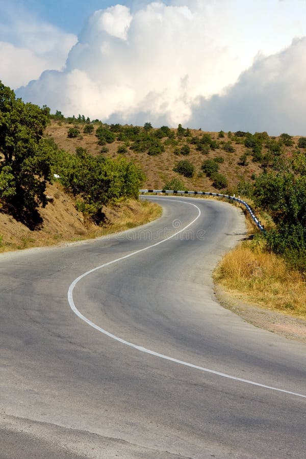 Road turn stock photo. Image of high, hill, sunlight - 16192750