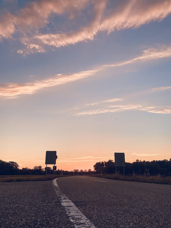 Road with Two Large Billboards on Either Side Stock Photo - Image of ...
