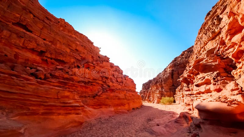 Road between Two Red Rocks Located in the Desert Stock Photo - Image of ...