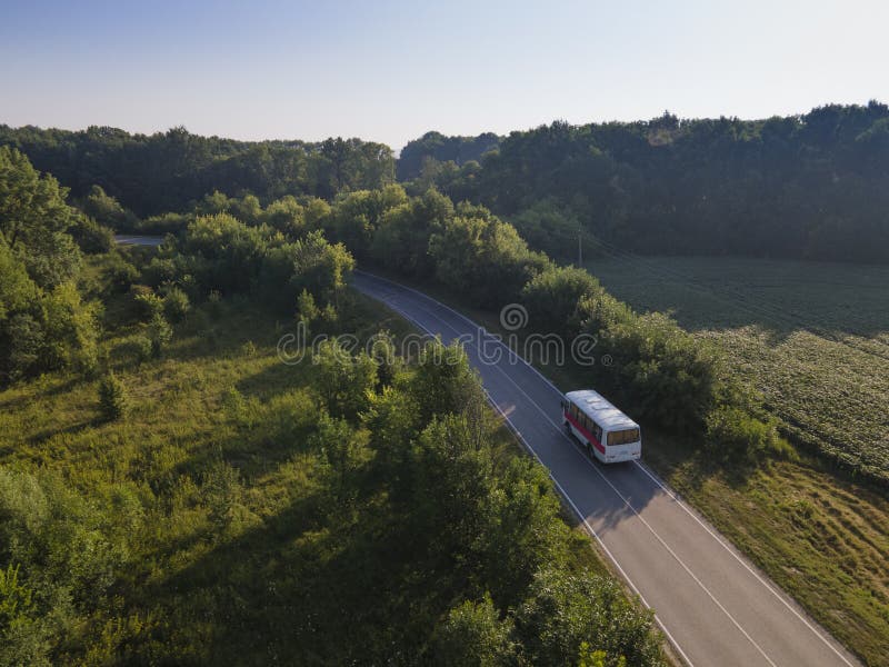 Road with White Bus in Beautiful Summer Forest Aerial Stock Photo ...