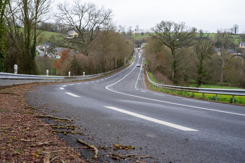 Road in Countryside and Give Way Sign. Warning Triangle Sign Stock ...