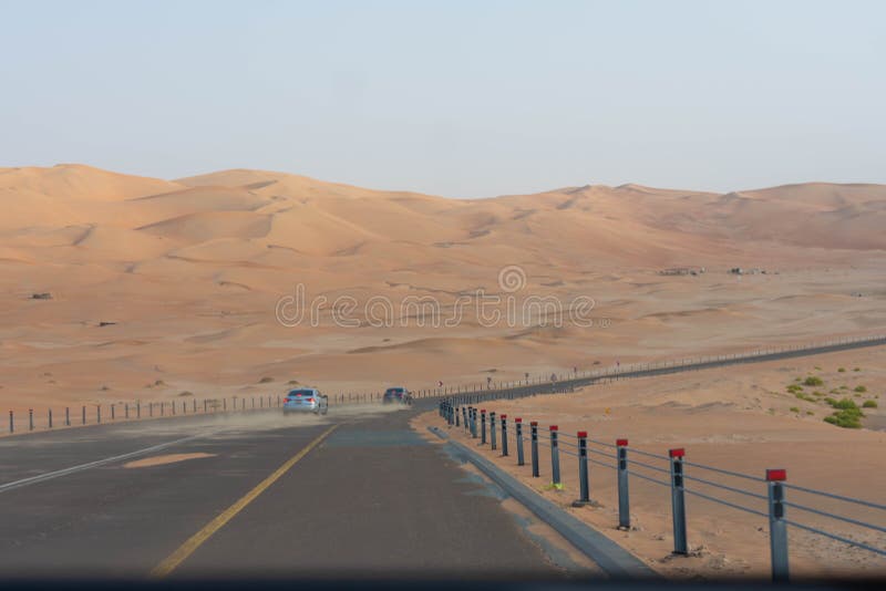 Road through the Arabic Sand Desert Stock Photo - Image of hill, dune ...