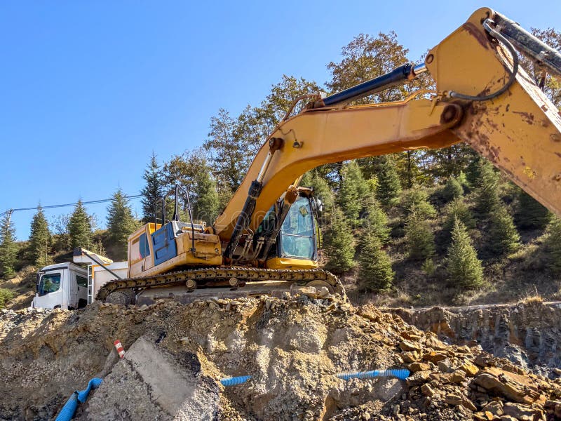 Road Widening Work on the Side of the Highway, Bulldozer and Truck are ...