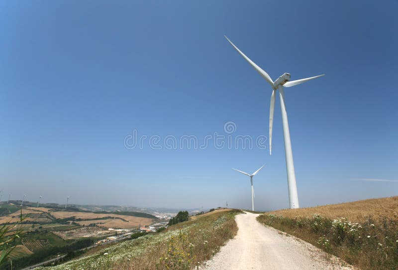 Road with wind turbines stock image. Image of plant, propeller - 2228819