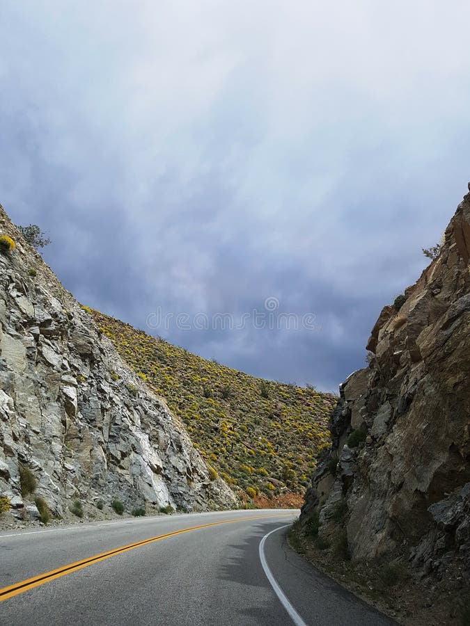 Road Winding through Mountains in California Desert Stock Image - Image ...