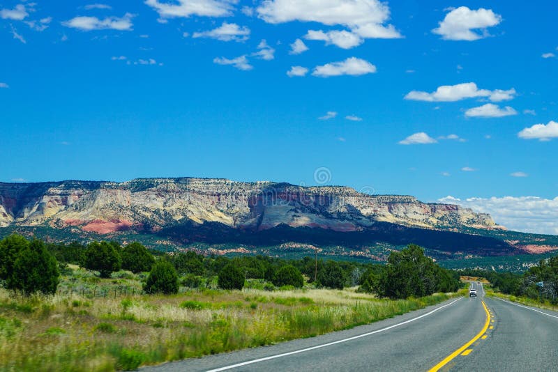 Road Winding through Rocky Scenery Stock Image - Image of zion, street ...