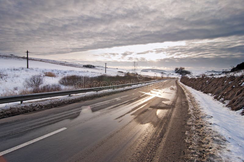 Road in Winter with Sun at Sunset Stock Photo - Image of endless, road ...