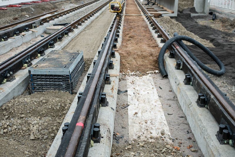 Road Work with Streetcar Rails Stock Photo - Image of stones, drainage ...