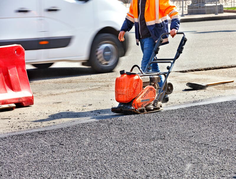 Worker With Compaction Machine Stock Photo - Image of building ...