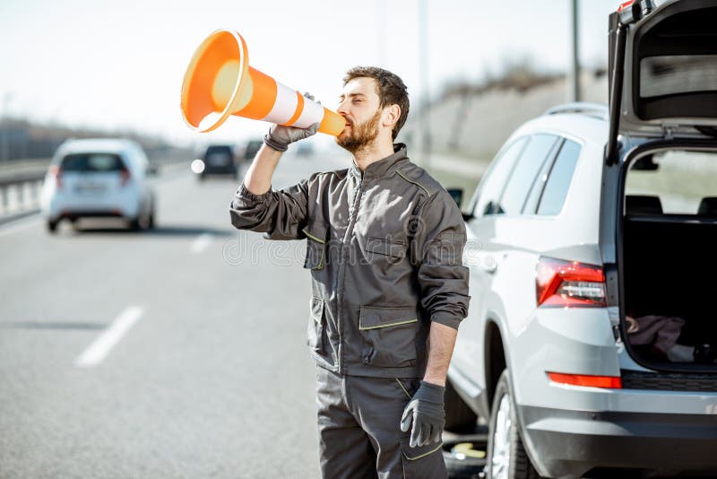 Road Worker Screaming for Help into the Road Cone Stock Photo - Image ...