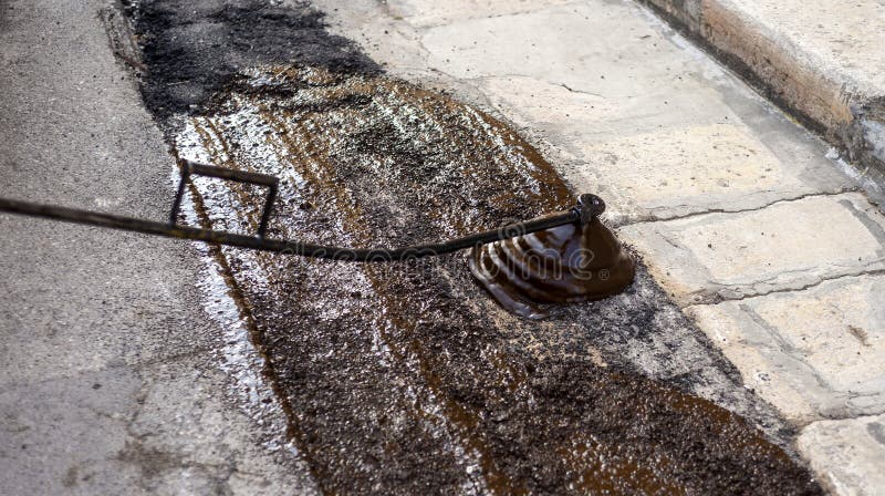 Road Worker Spraying Bitumen Emulsion Stock Photo - Image of equipment ...