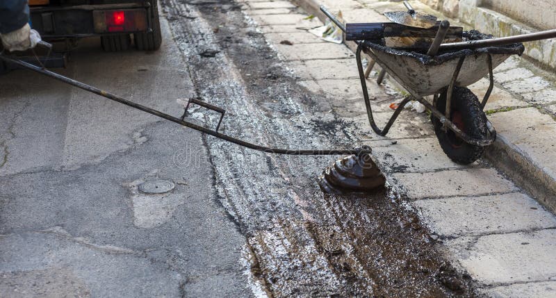 Road Worker Spraying Bitumen Emulsion Stock Photo - Image of ground ...