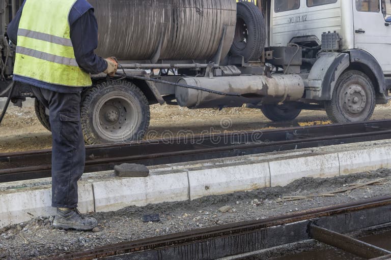 Road Worker Spraying Manually Bitumen Emulsion Stock Photo - Image of ...