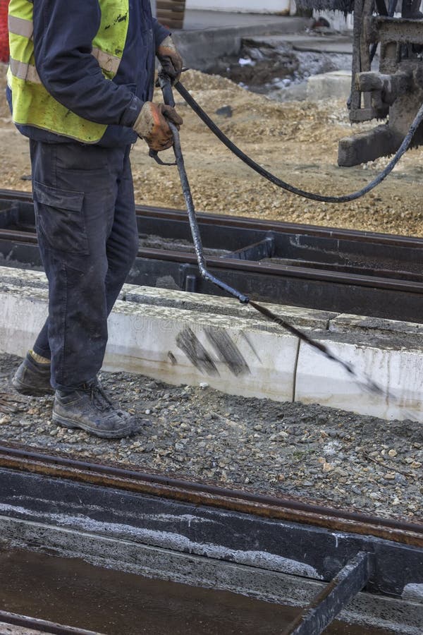 Road Worker Spraying Manually Bitumen Emulsion 2 Stock Image - Image of ...