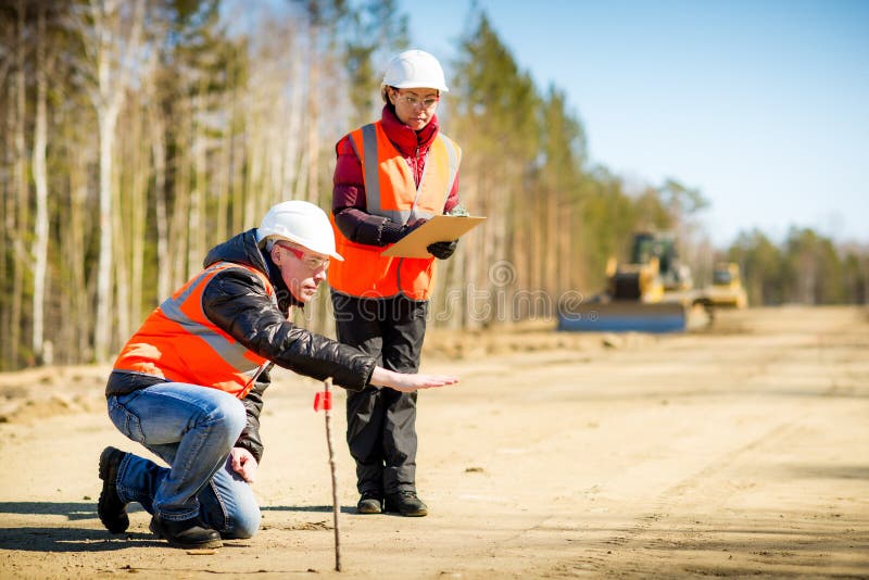 Road Workers Inspecting Construction Stock Photo - Image of labor ...